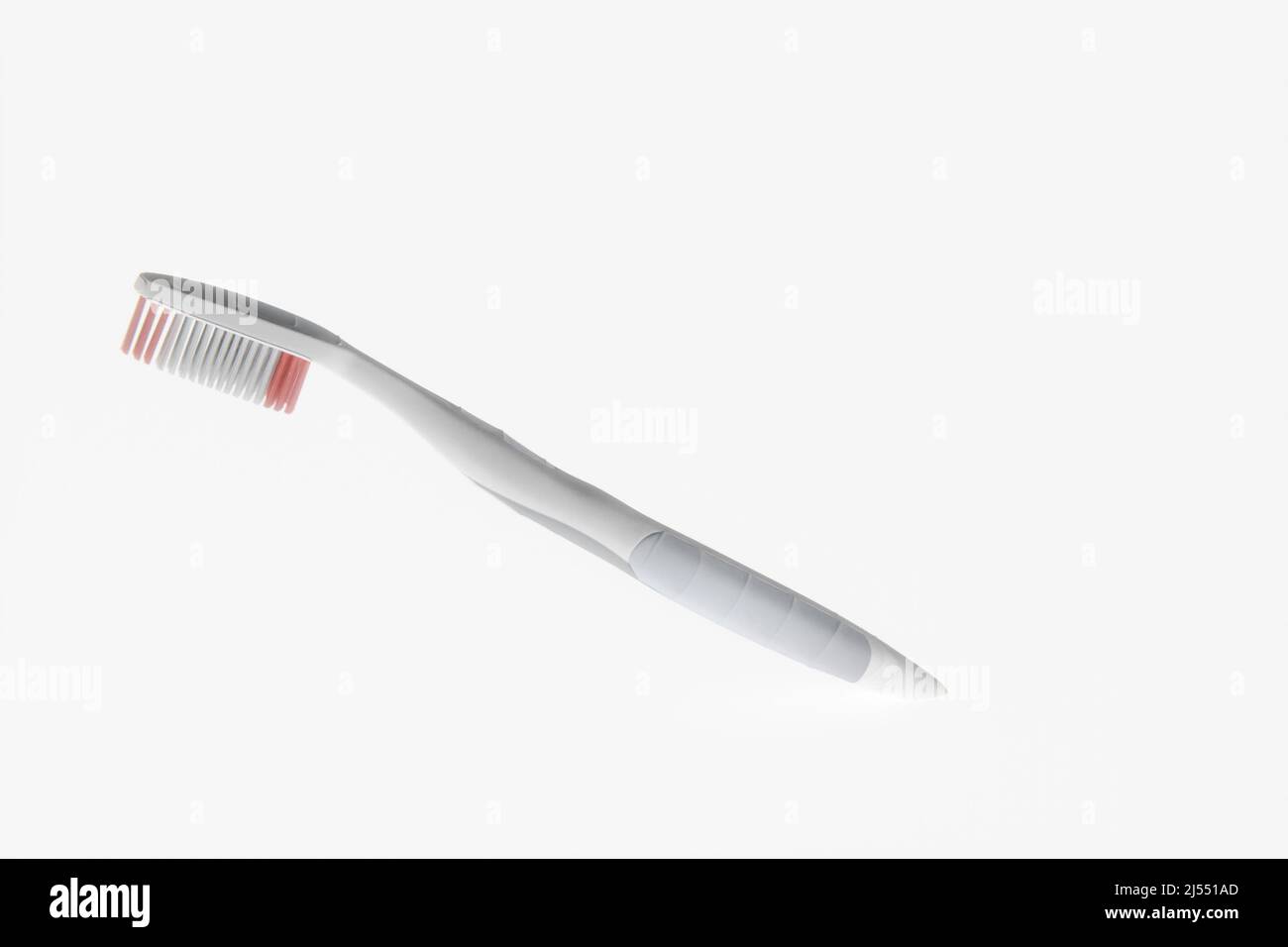 3d rendering white plastic toothbrush isolated on a white background ...