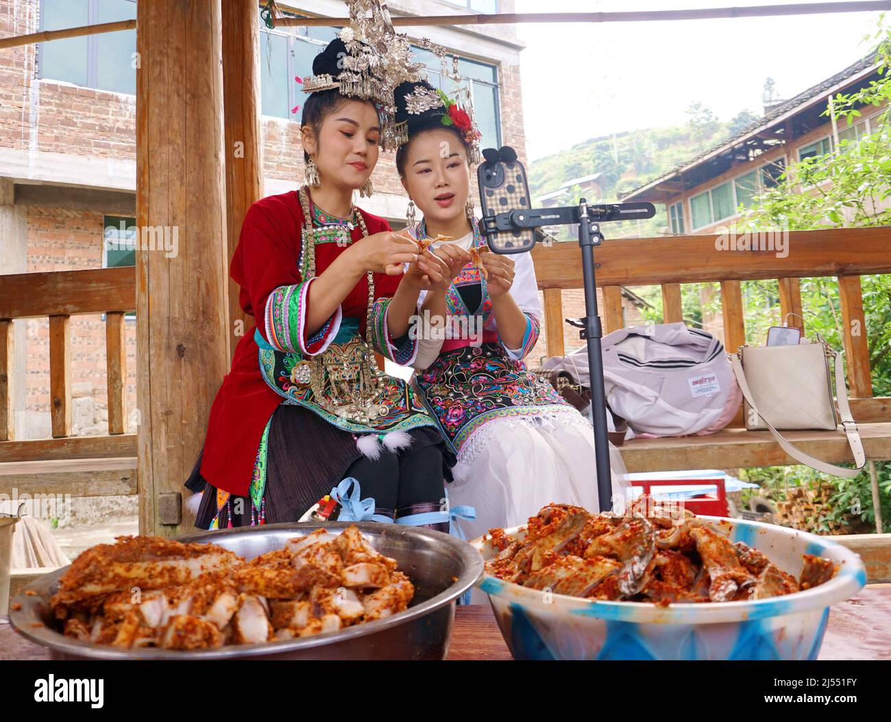 CONGJIANG, CHINA - APRIL 20, 2022 - An anchor sells goods via live ...
