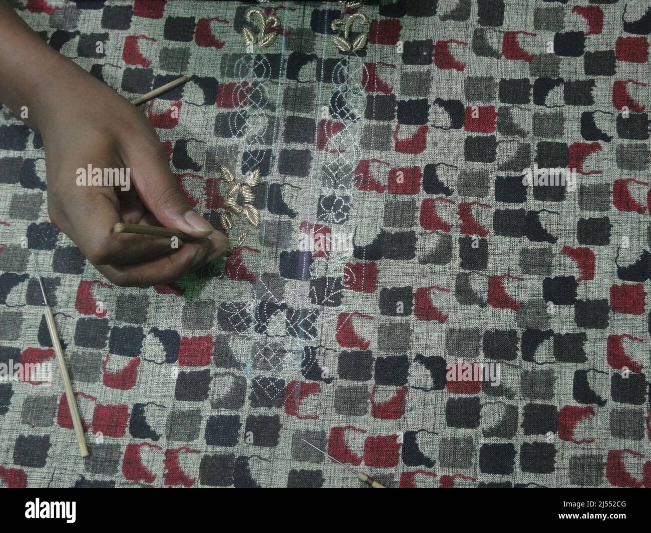 Dhaka, Bangladesh. 20th Apr, 2022. A worker of the Geneva camp engaged ...