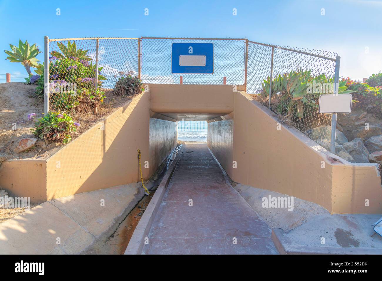 Concrete underground pathway heading to the beach at San Clemente ...