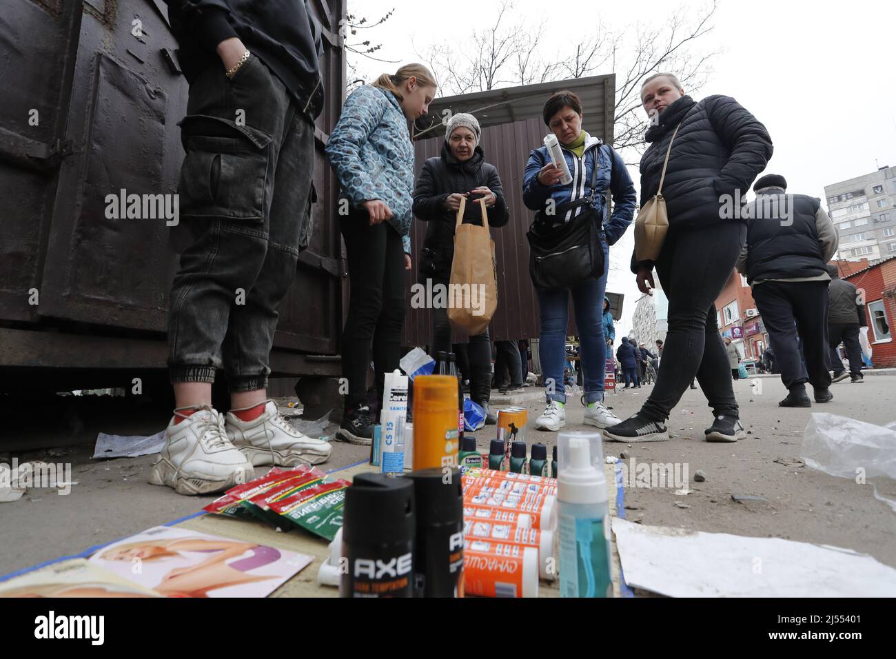 Mariupol. 19th Apr, 2022. Residents shop at a market in Mariupol on ...