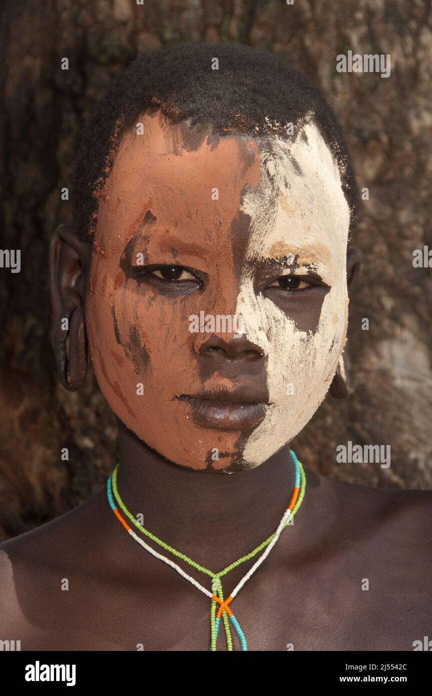 Young Surma woman with traditional body paintings, Kibish, Omo river ...