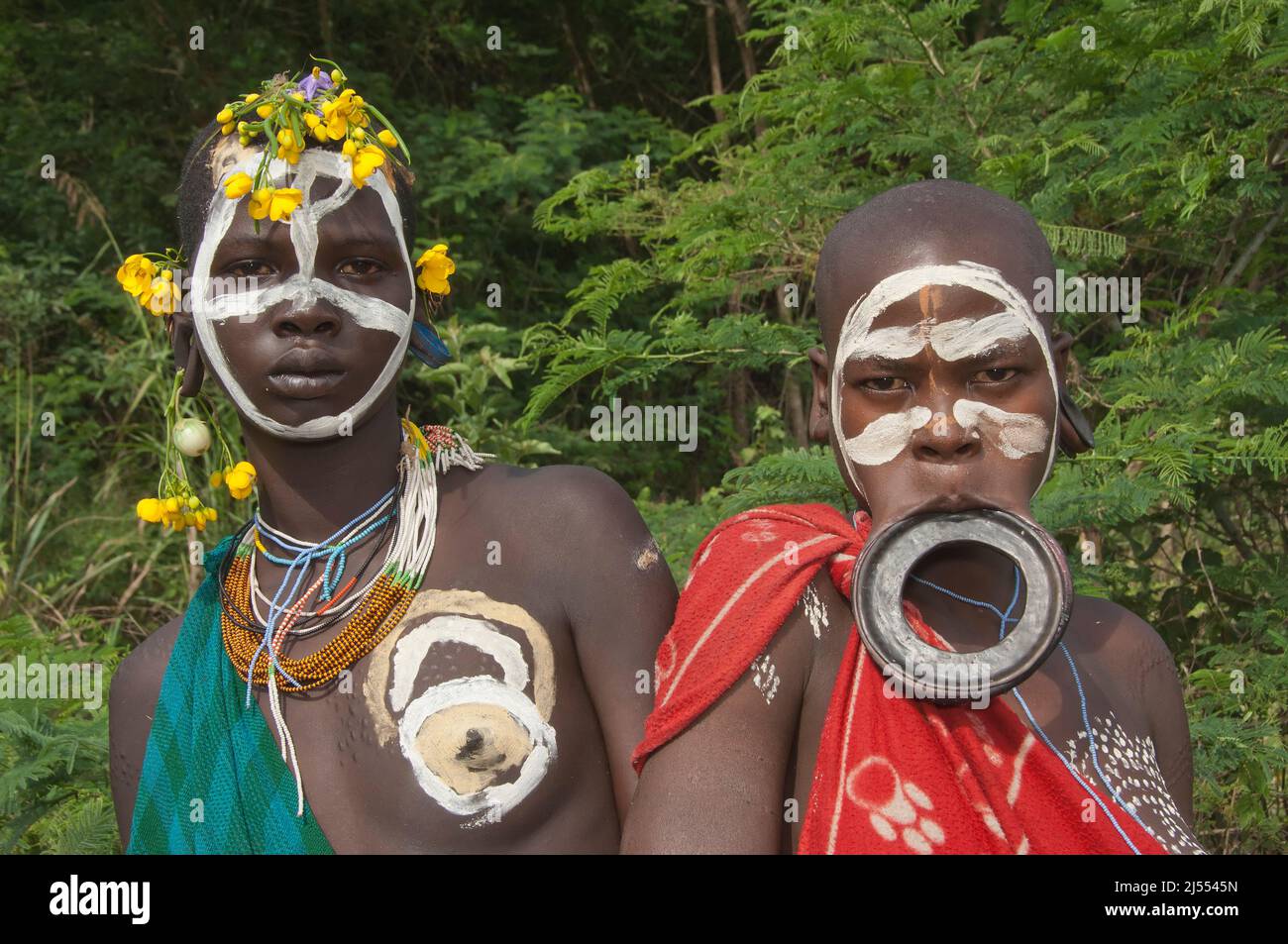 Young Surma women with lip plate, Kibish, Omo River Valley, Ethiopia ...