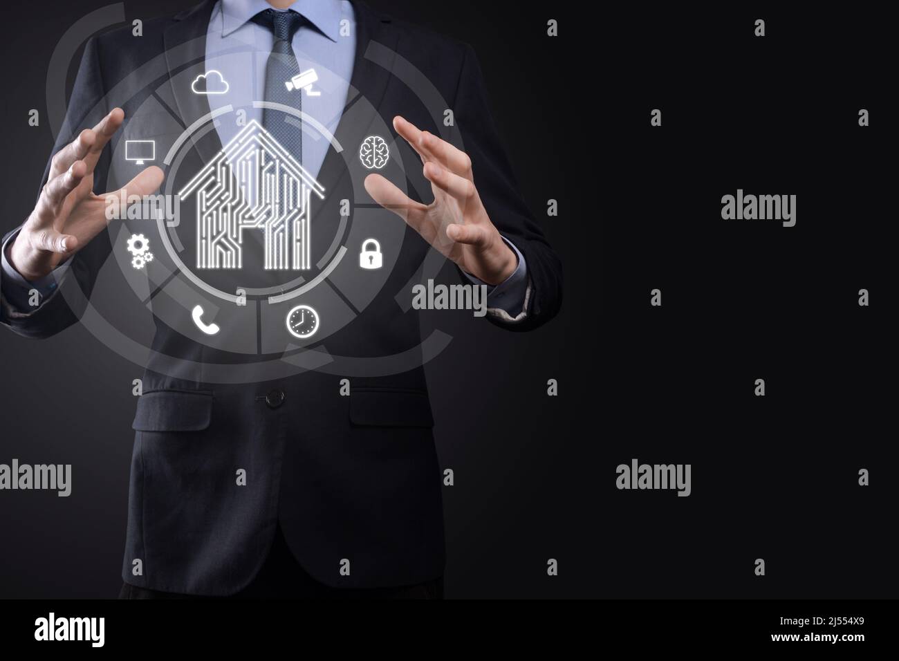 Businessman hold house icon.Smart home controlled, intelligent house ...