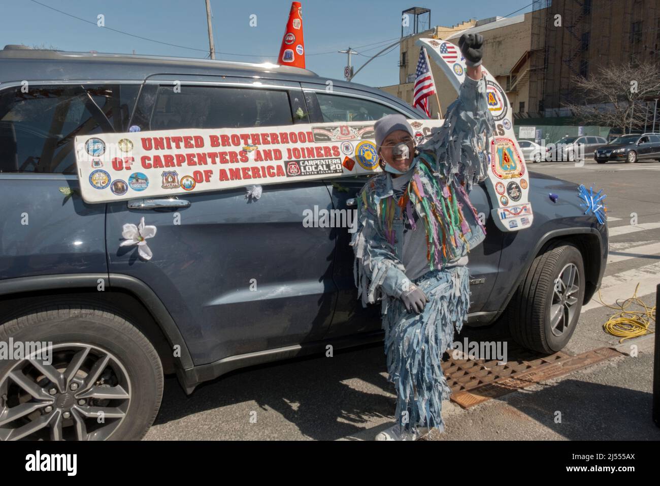 A member of the Carpenters Union dressed as a rat protests at the site ...