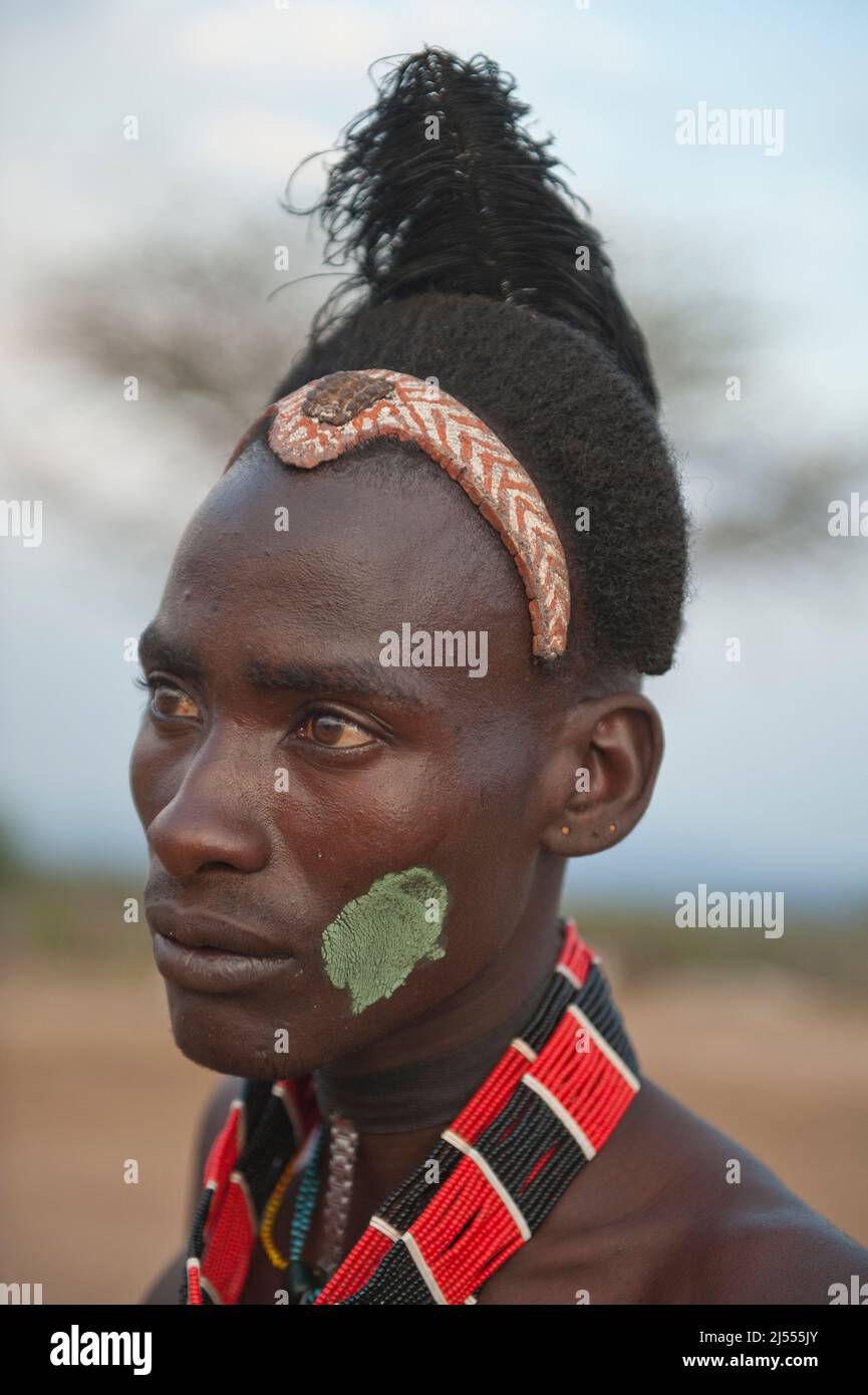 Portrait of a Hamar man with necklaces and traditional hairstyle, Omo ...