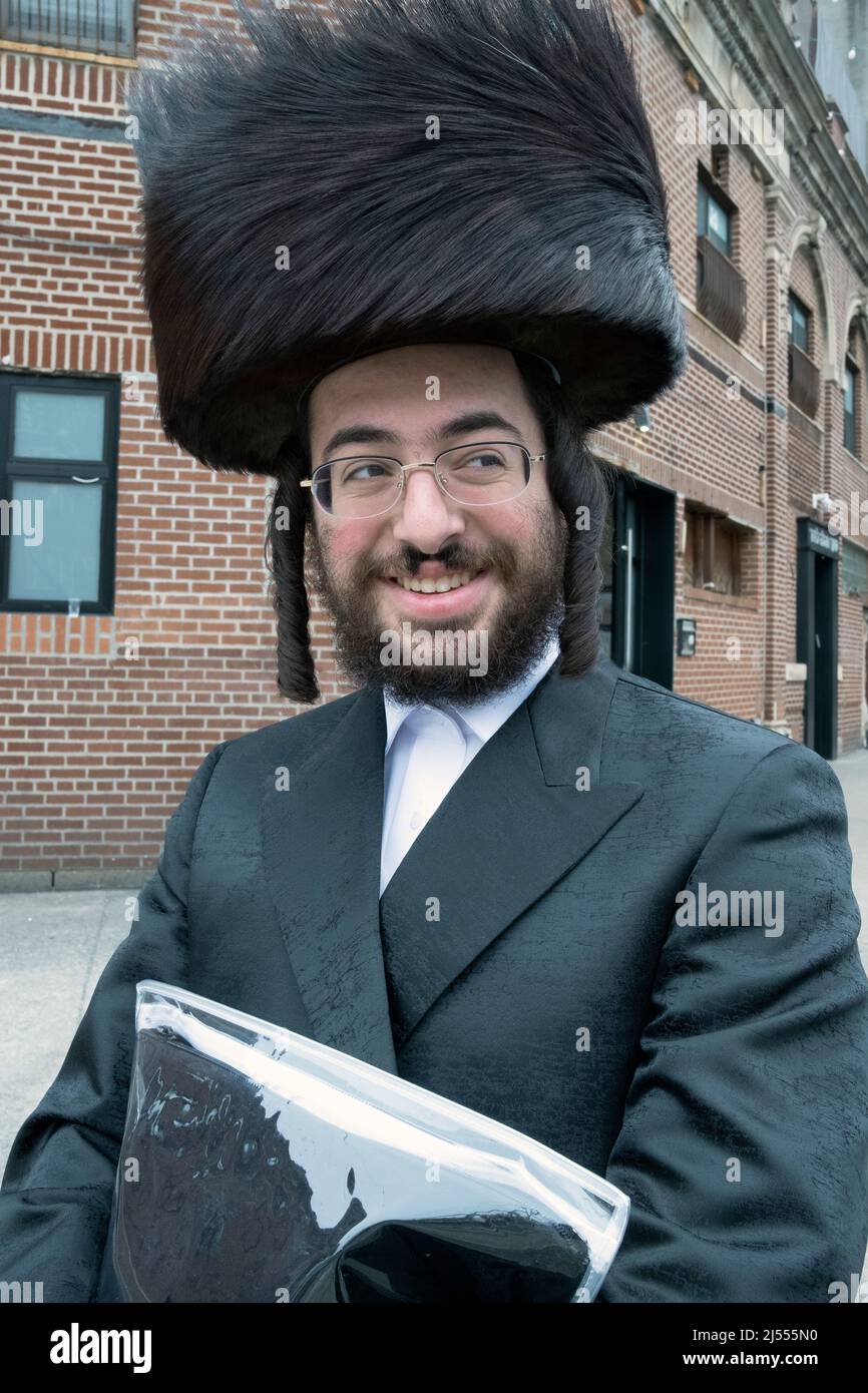 On Passover, a newly married jewish man wearing a shtreimel heads home ...