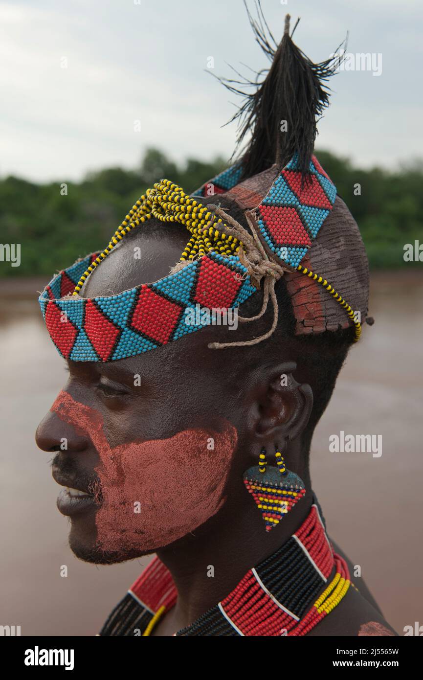 Portrait of a Karo man with facial paintings and head adornment, Omo ...