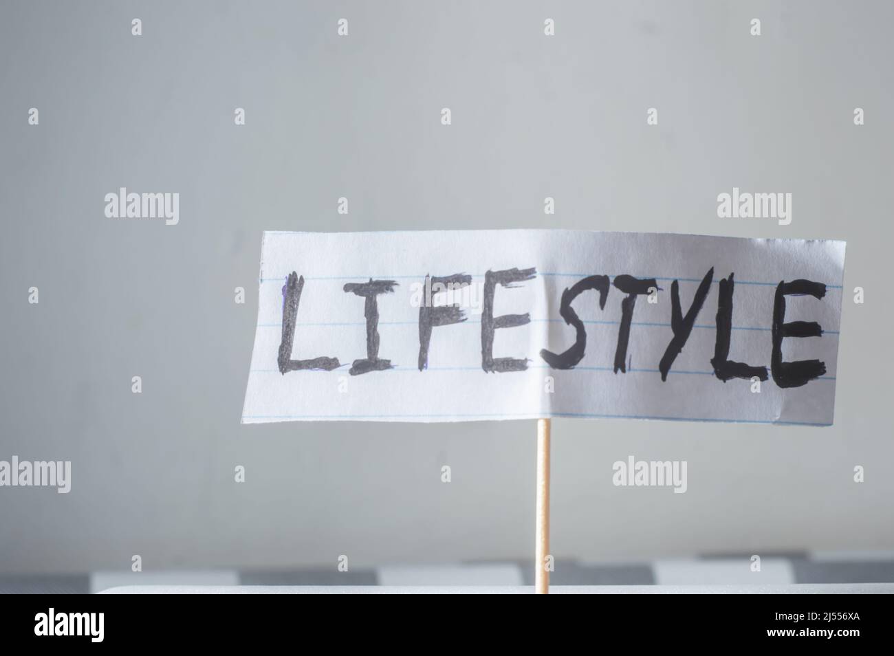 Lifestyle,word written on a piece of paper,soured white background ...