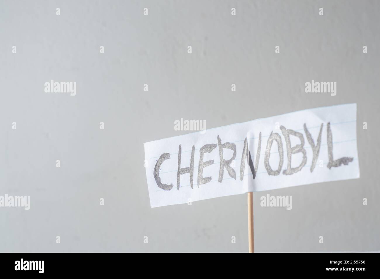Chernobyl,word written on a cut paper,soured white background and copy ...