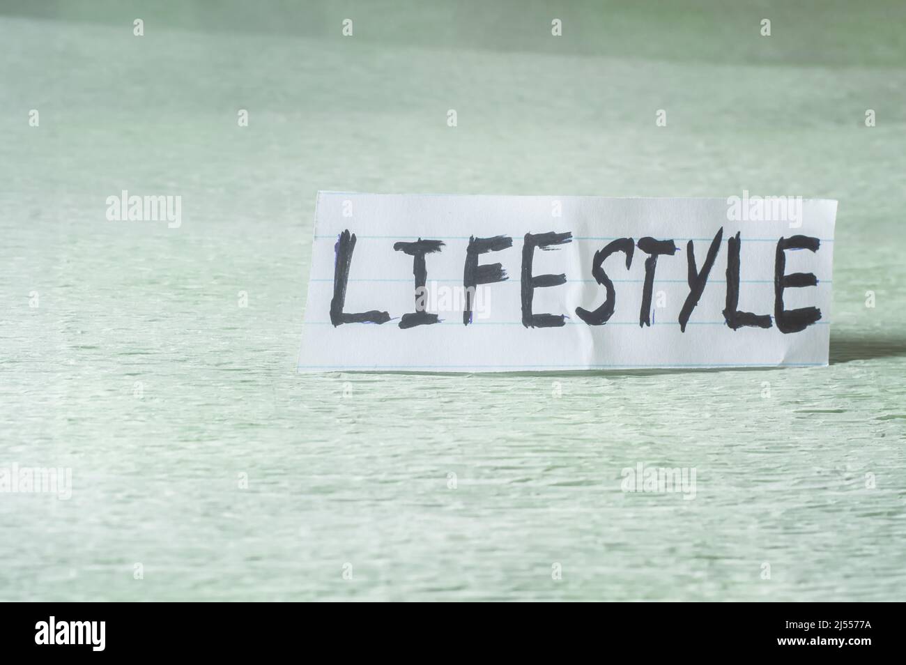 Lifestyle,word written on a paper that is in a light green place Stock ...