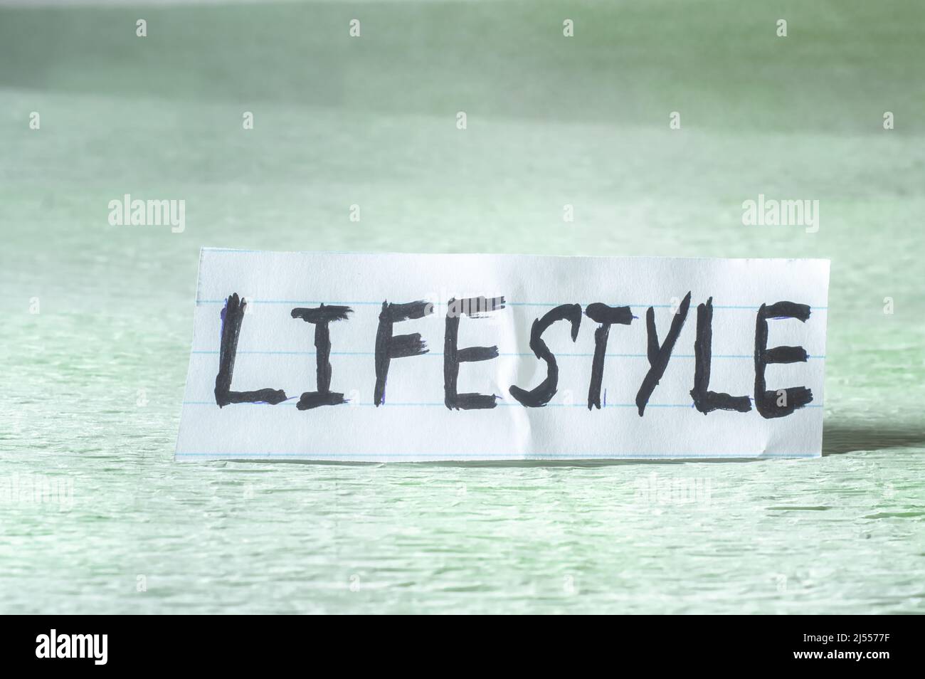Lifestyle,word written on a paper that is in a light green place Stock ...