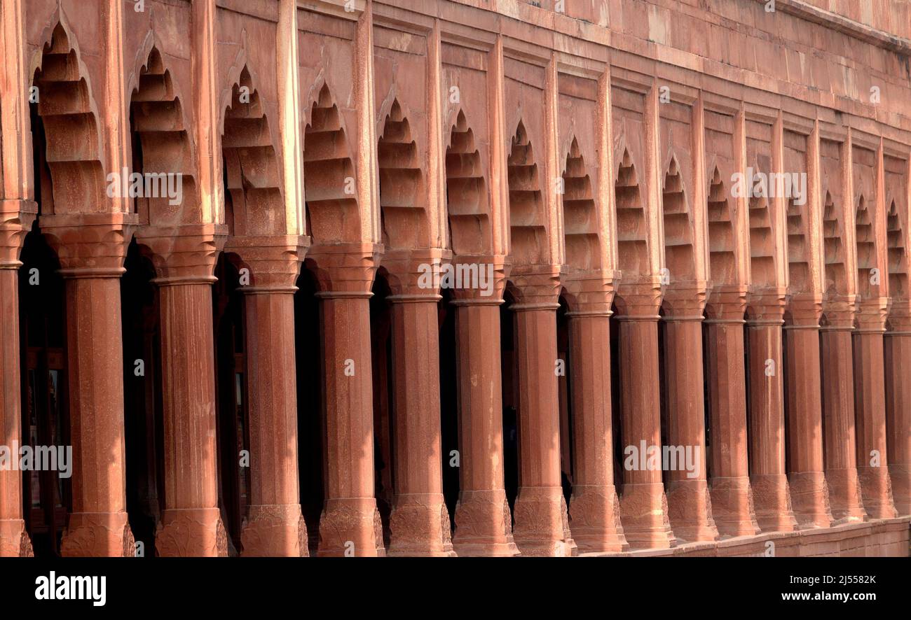 Row of columns inside the Taj Mahal made of red sandstone in Agra,India ...