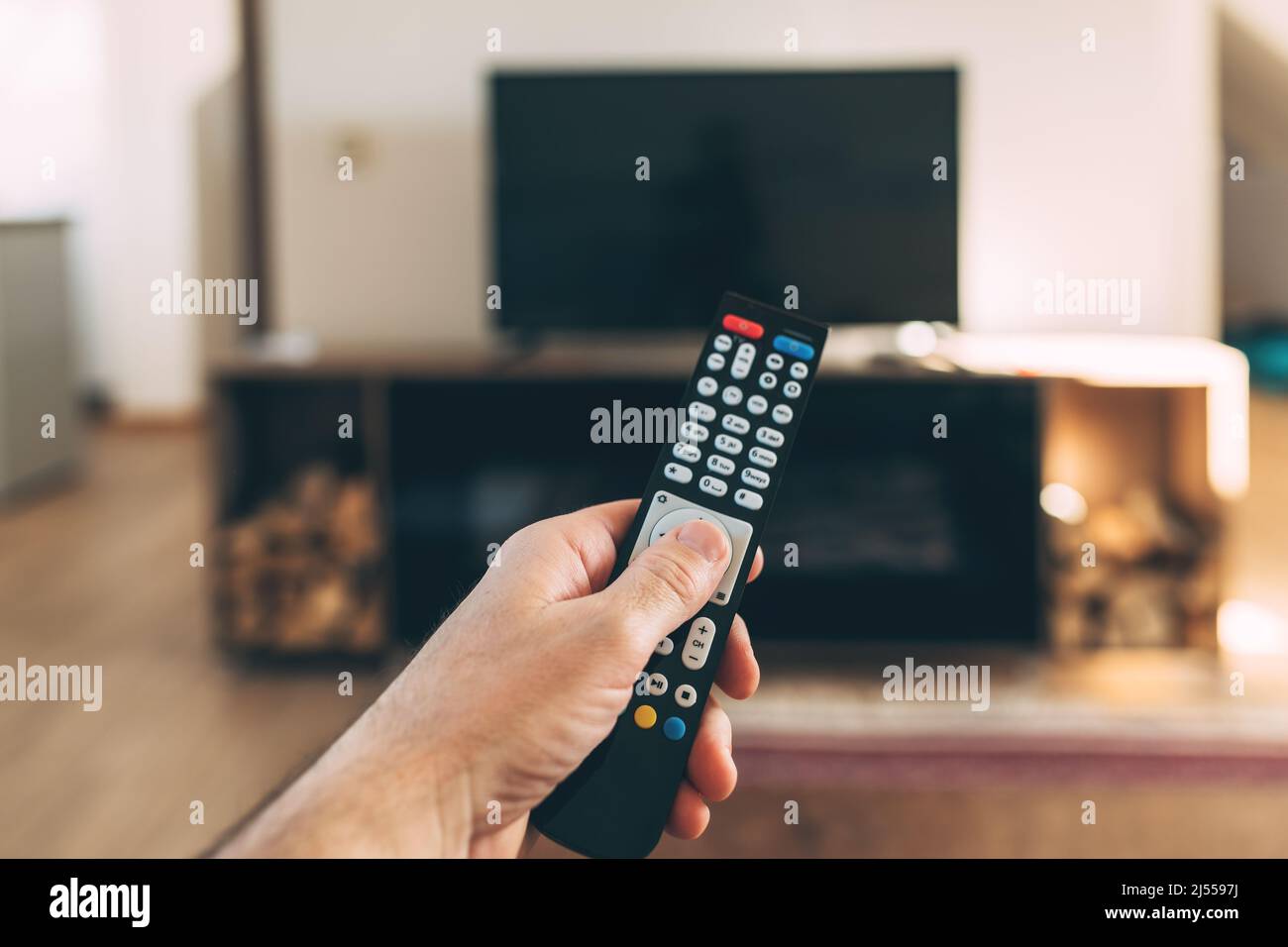 Hand tv remote hi-res stock photography and images - Alamy