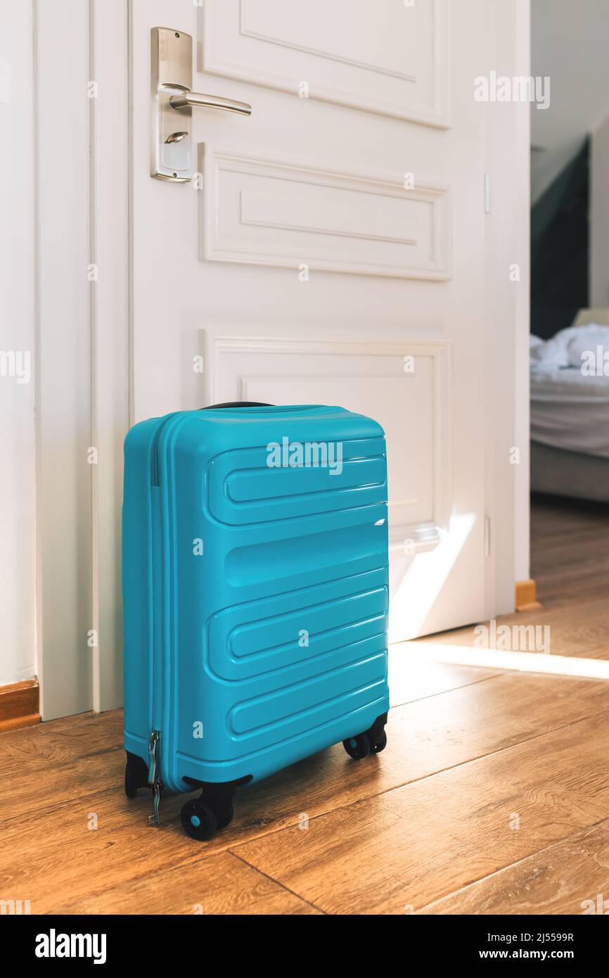 Light blue travel suitcase hi-res stock photography and images - Alamy