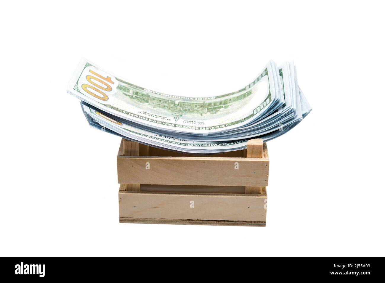 Paper money lies in small wooden box, isolated white background Stock ...