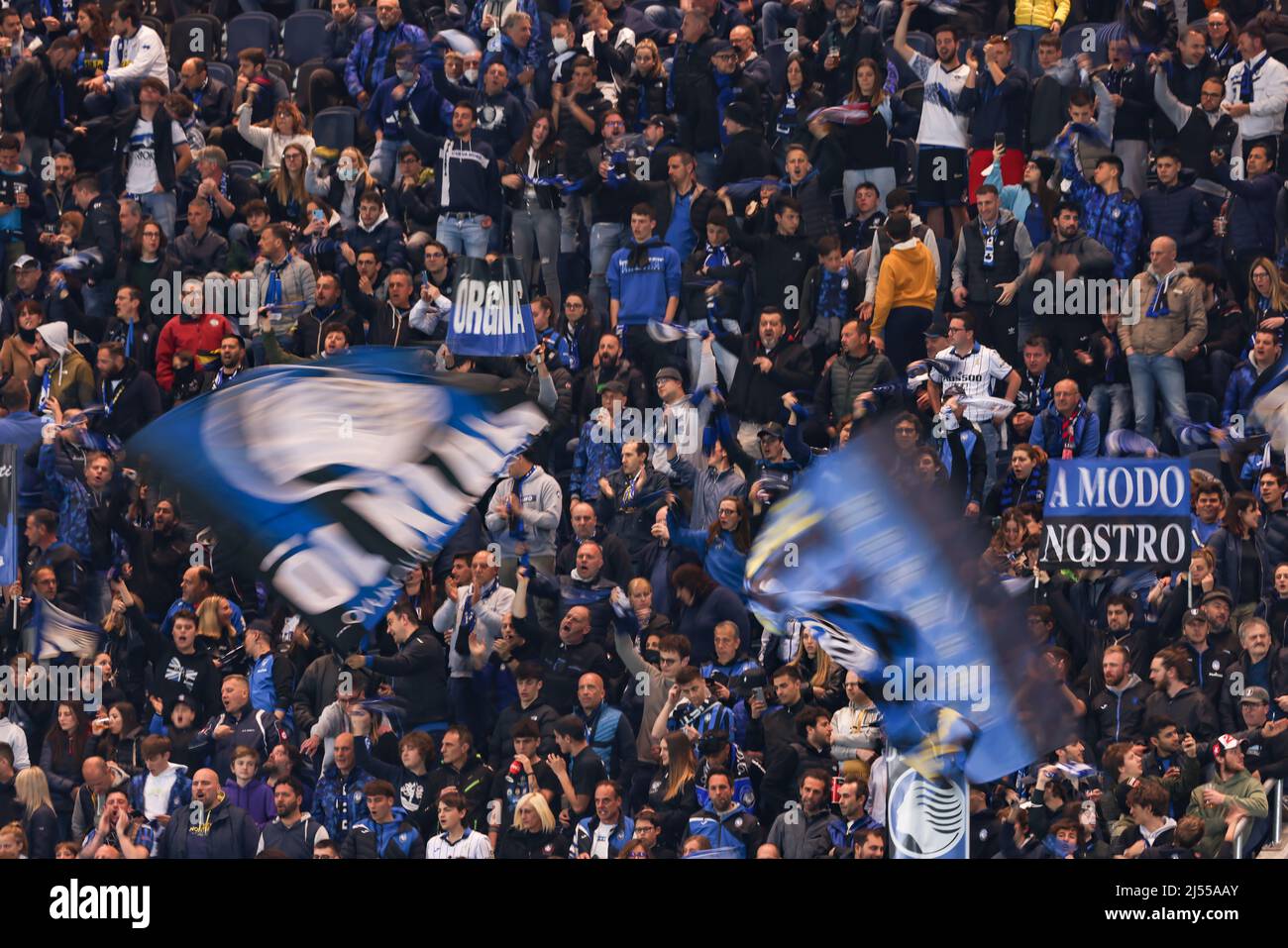 Bergamo, Italy, 18th April 2022. Atalanta BC fans wave flags during the ...