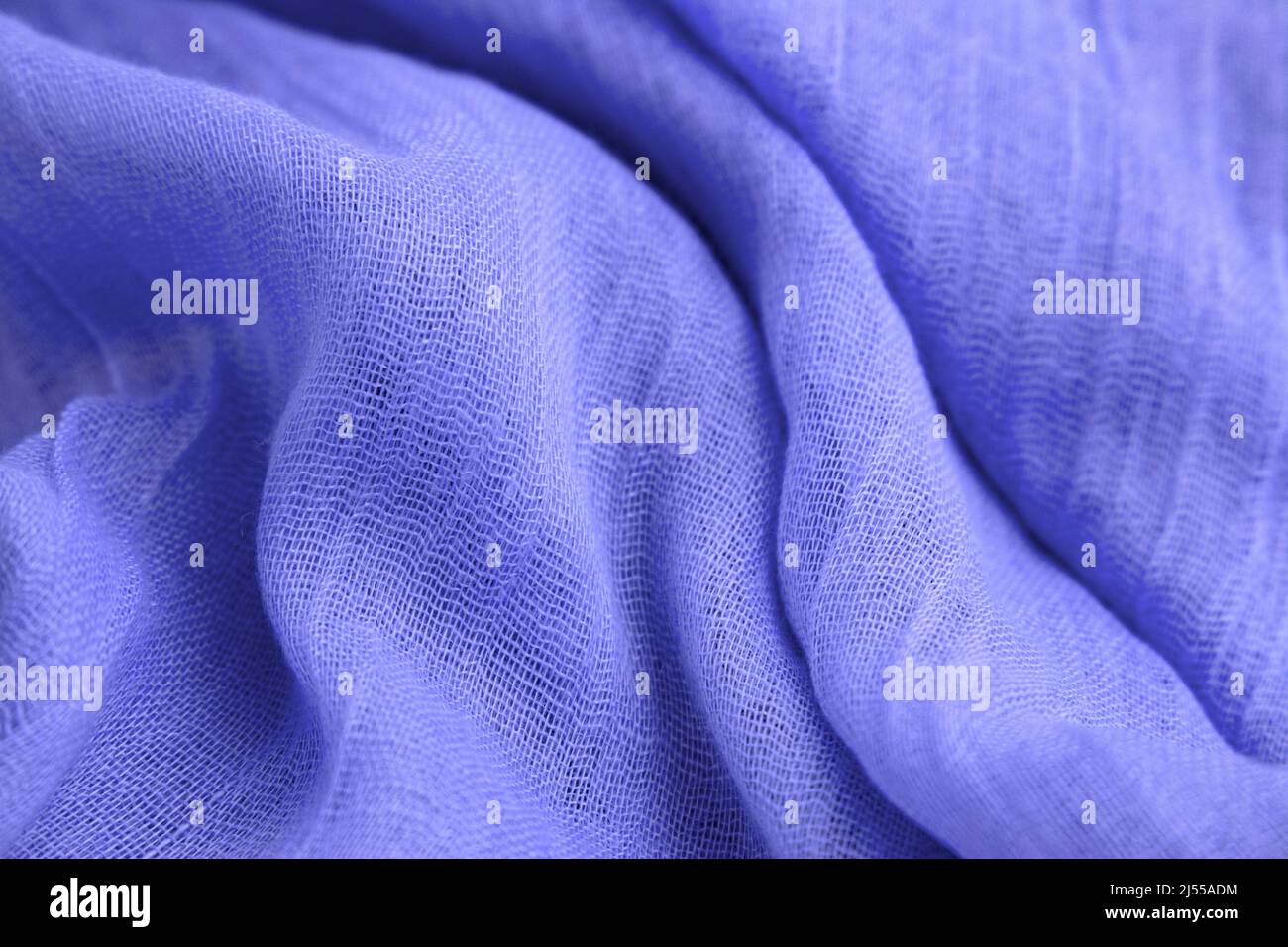 Textile texture with waves close-up. Fabric tinted in Very Peri color ...