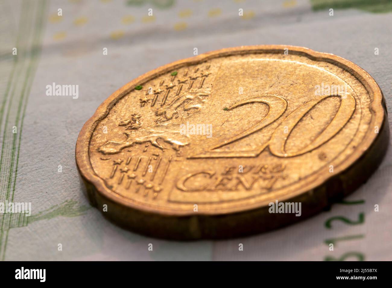 Close up shot of twenty euro cents with map of Europe on the coin face ...