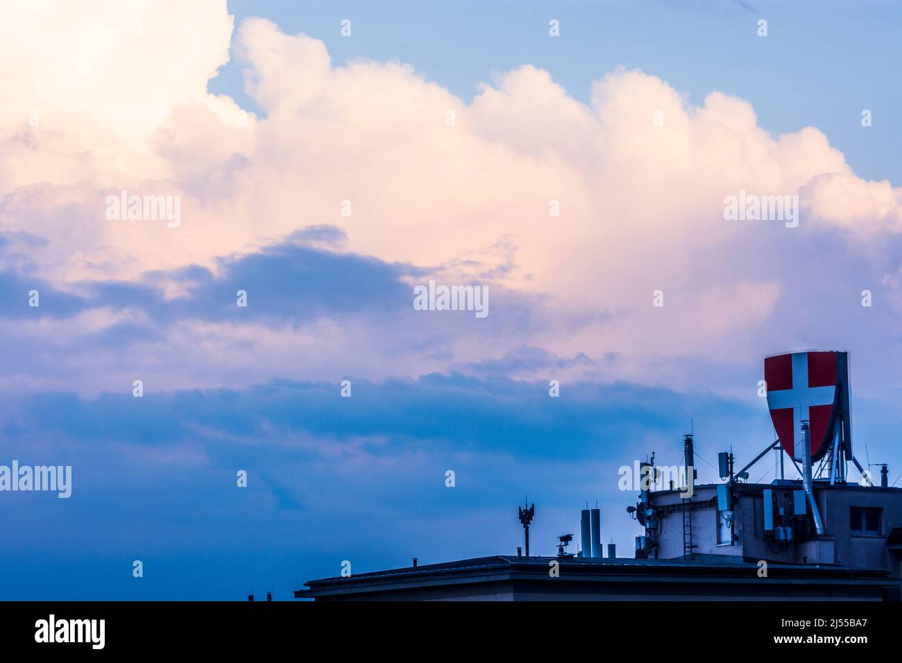 Wien, Vienna: city of Vienna coat of arms on rooftop of an apartment ...
