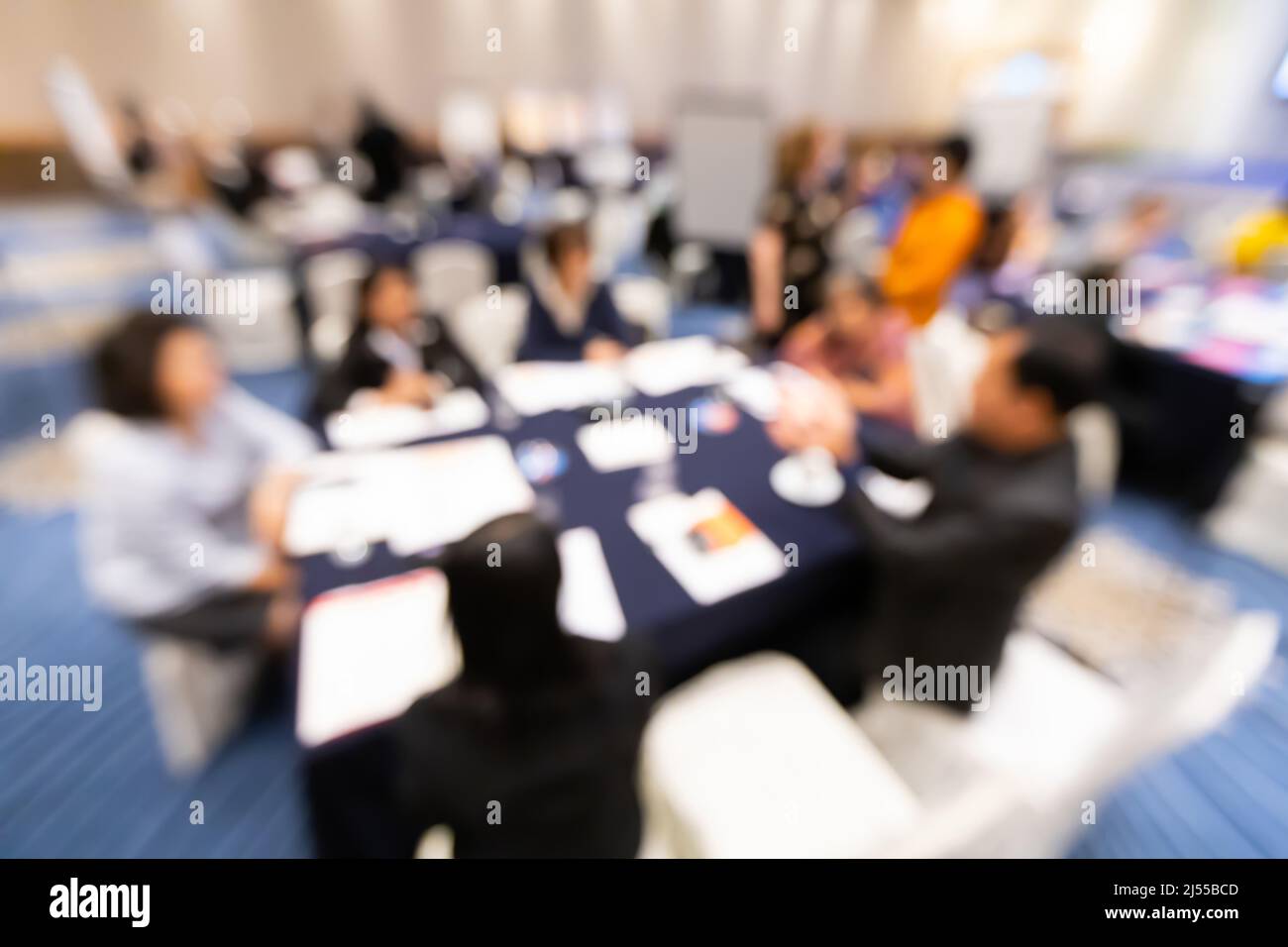 Abstract blur group of people in business training workshop ...