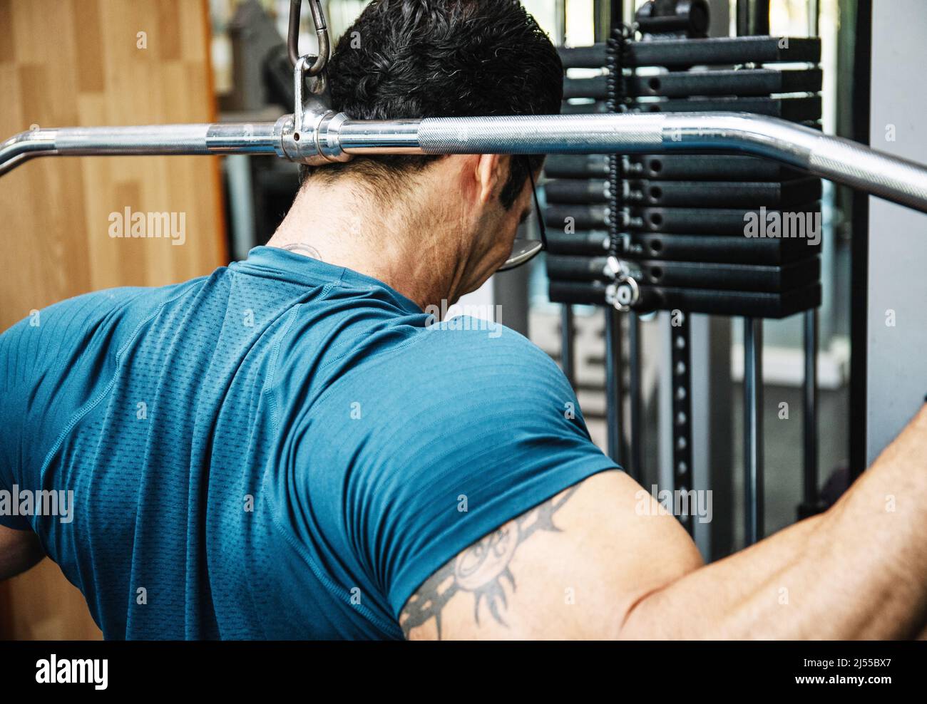 Stock photo of Detail of the face of a man doing strength with glasses ...