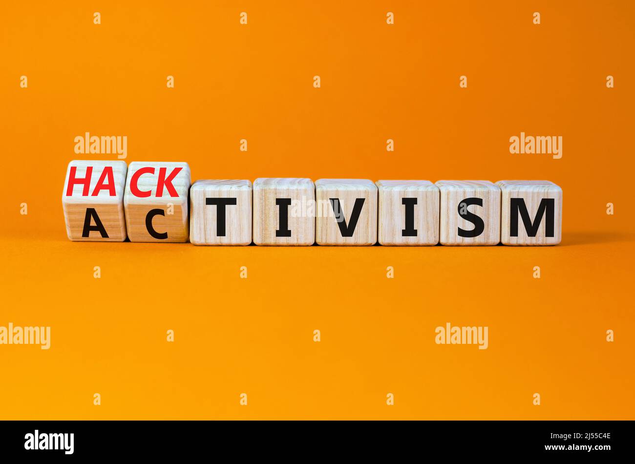 Activism or hacktivism symbol. Turned wooden cubes and changed the ...