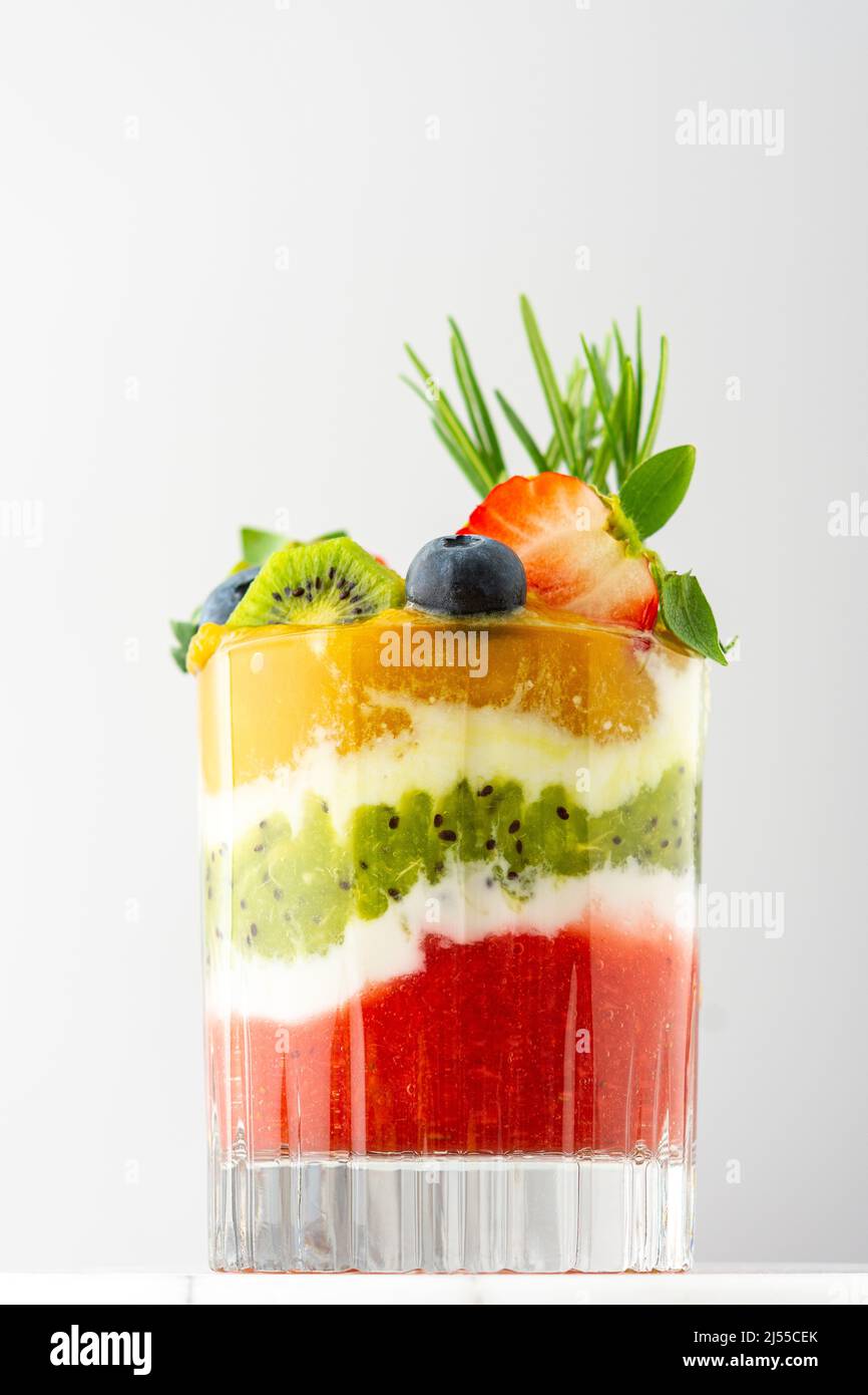 Strawberry, kiwi and mango smoothies with natural yogurt in glasses ...