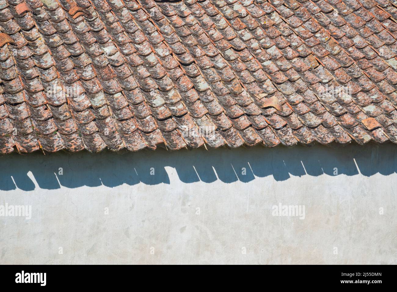 Tiled roof and wall Stock Photo - Alamy