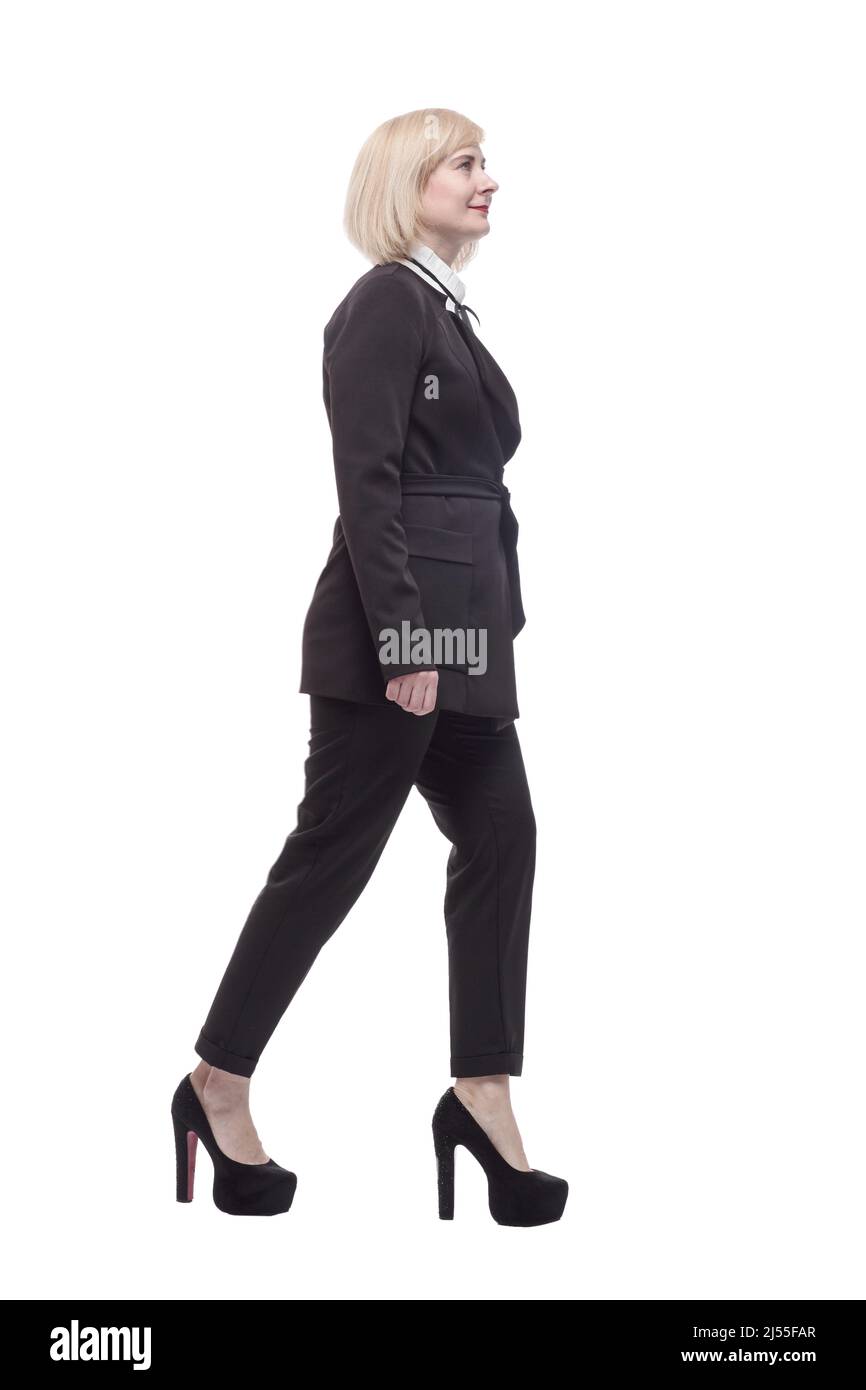 in full growth. confident business woman striding forward Stock Photo ...