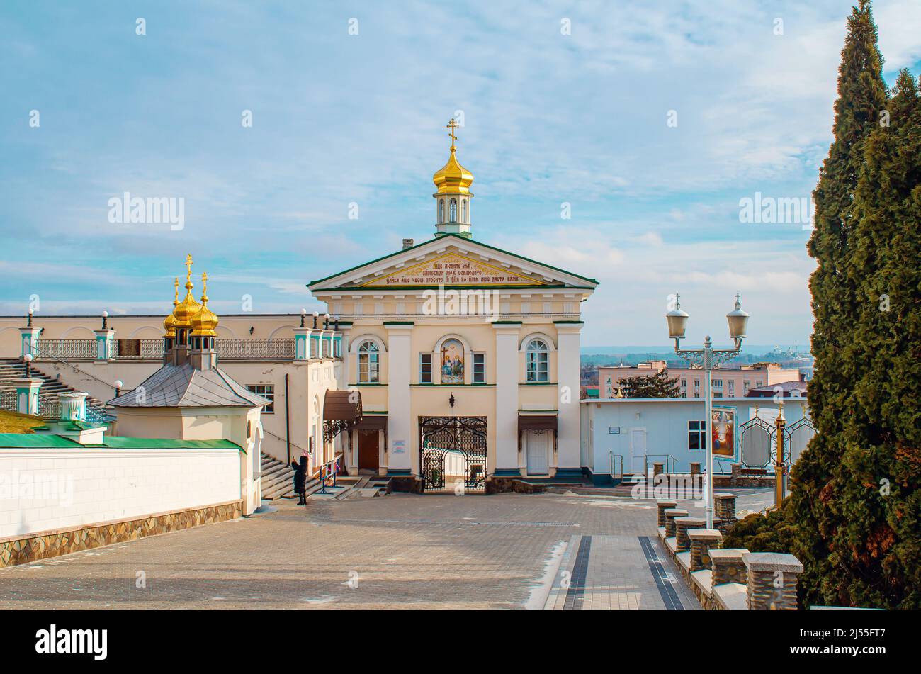Square with cobblestones in front of entrance to complex Orthodox monastery of Pochaiv Lavra ...
