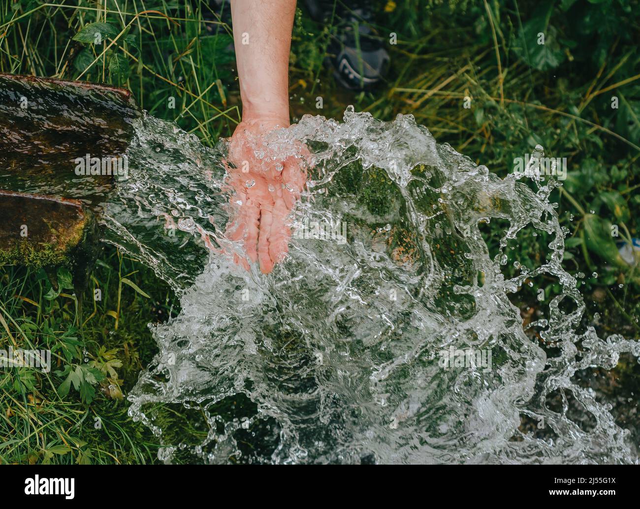 Pleasant freshness of cold running water. Crystal source in natural ...