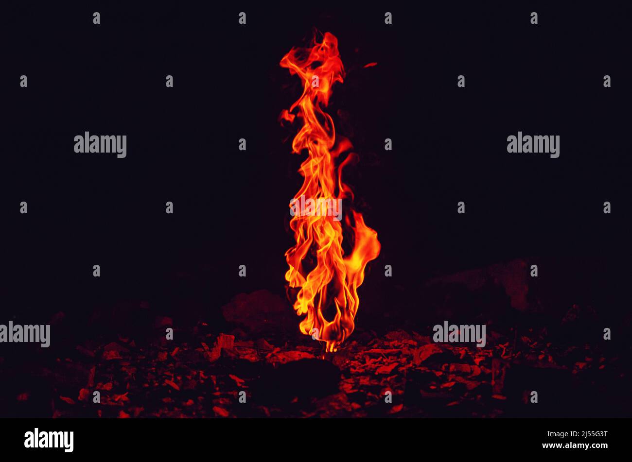 High pillar of fire coming out of stone. Red fire burning flame Stock ...