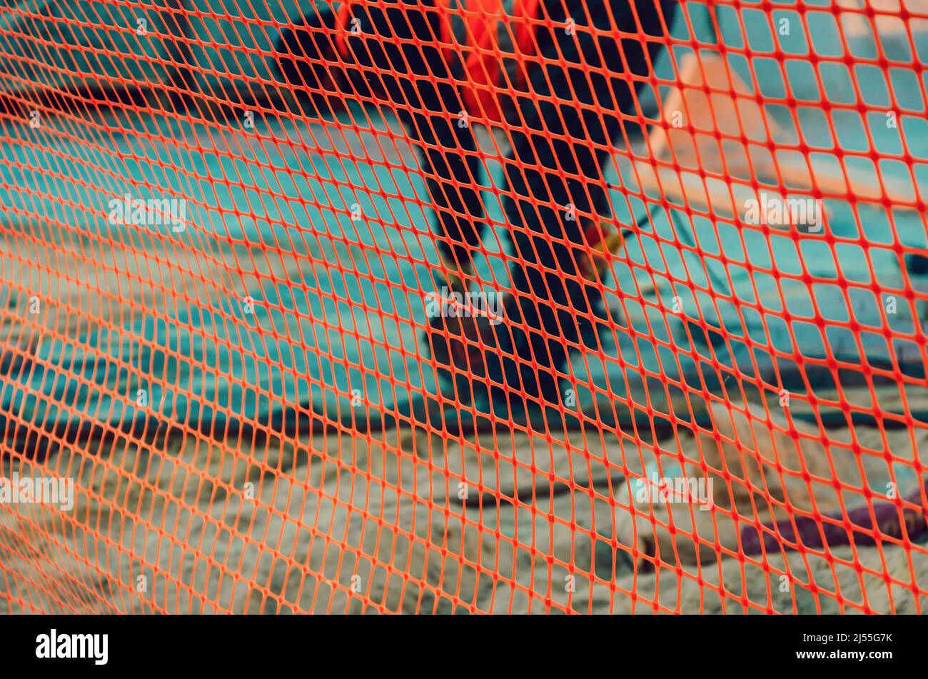 Red mesh for road works. Abstract background. Blur Stock Photo - Alamy