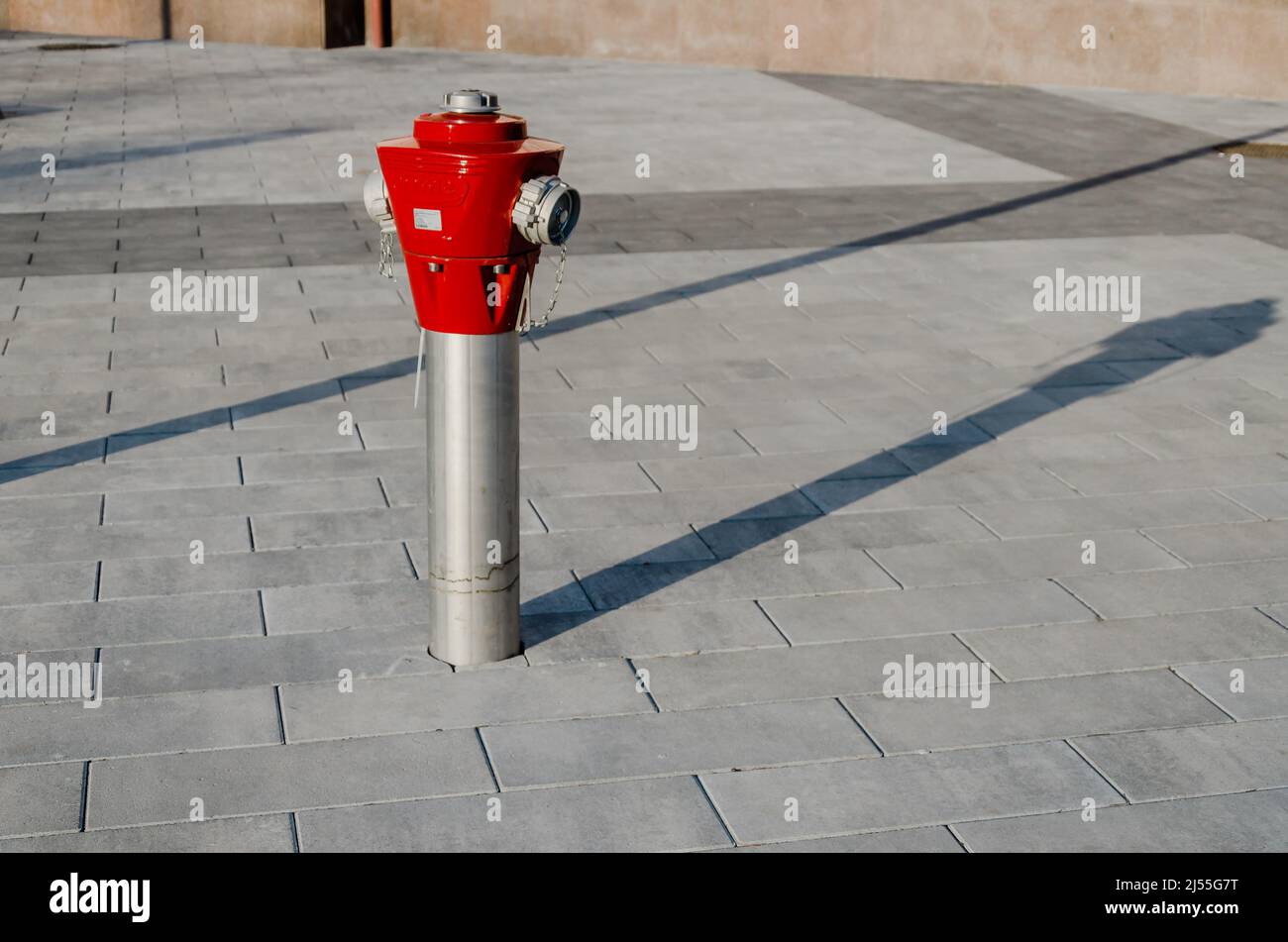 Fire hydrant on pavement in city. Close Stock Photo - Alamy