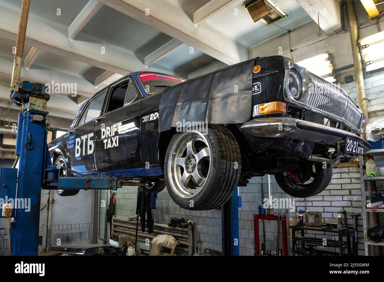 SAINT PETERSBURG, RUSSIA - APRIL 08, 2022: Black custom Volga GAZ-24 on ...