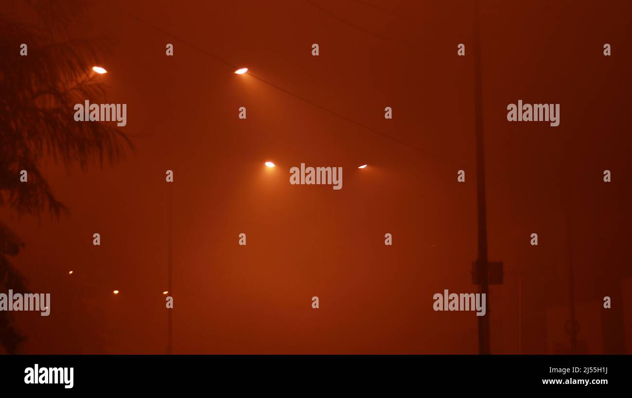 Street light night time orange color back ground Stock Photo - Alamy