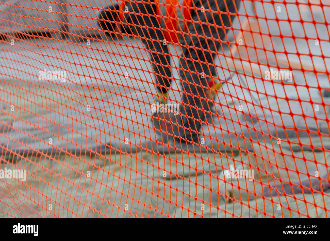 Red mesh for road works. Abstract background. Blur Stock Photo - Alamy