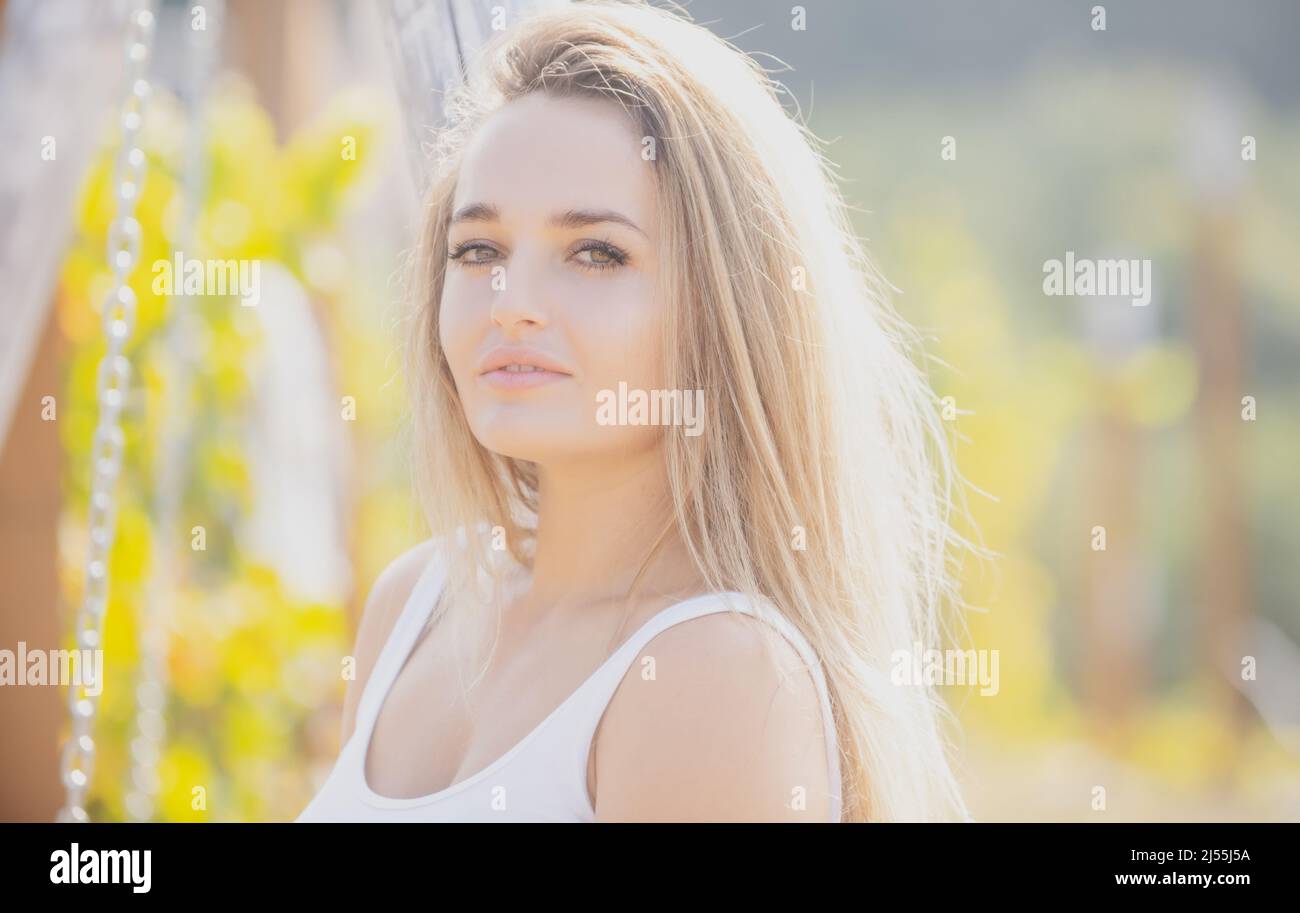 Portrait of a young woman, close up face of beautiful woman outdoor ...