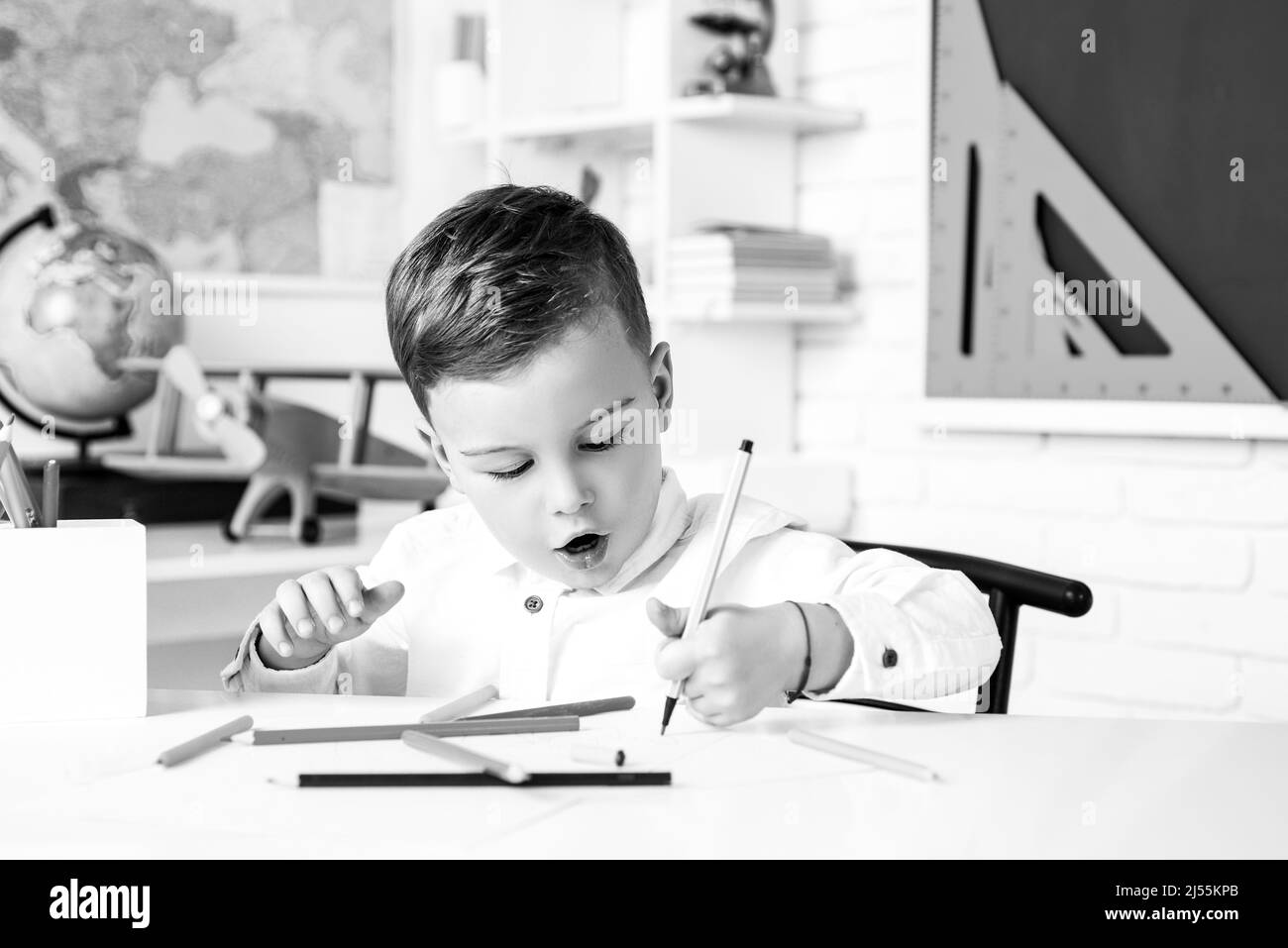 Daycare kids learning Black and White Stock Photos & Images - Alamy