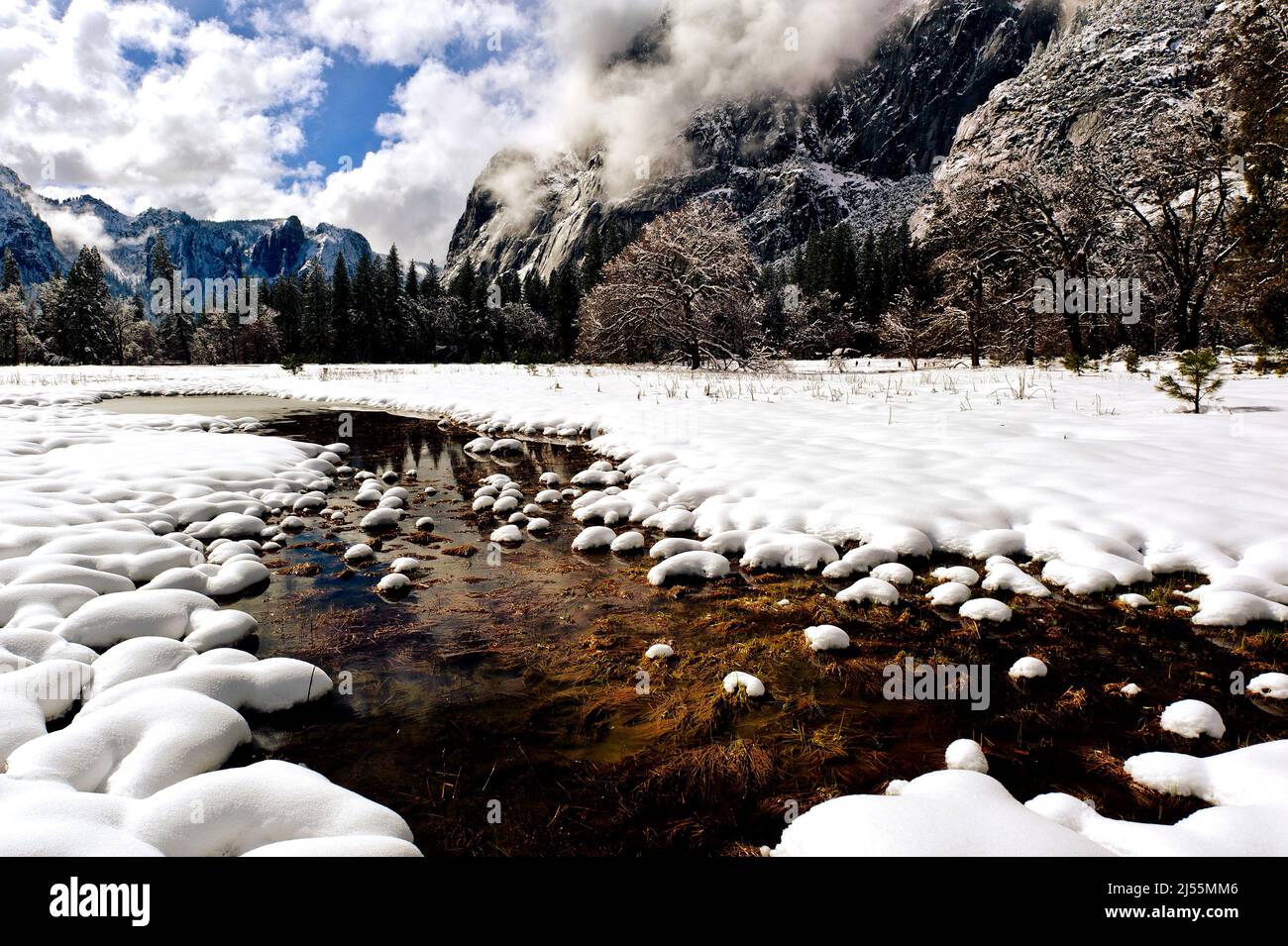 Yosemite Valley scene in the morning after overnight snowfall along an ...