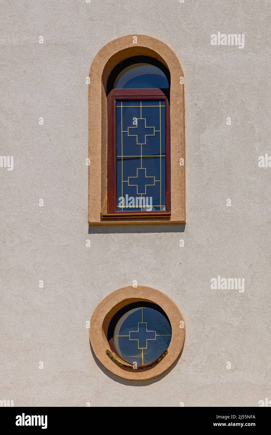 Two Windows With Cross Symbols at New Church Building Stock Photo - Alamy