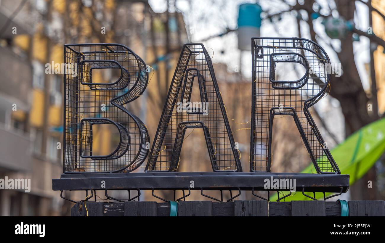 3d Black Metal Wire Sign Bar Letters at Fence Stock Photo - Alamy