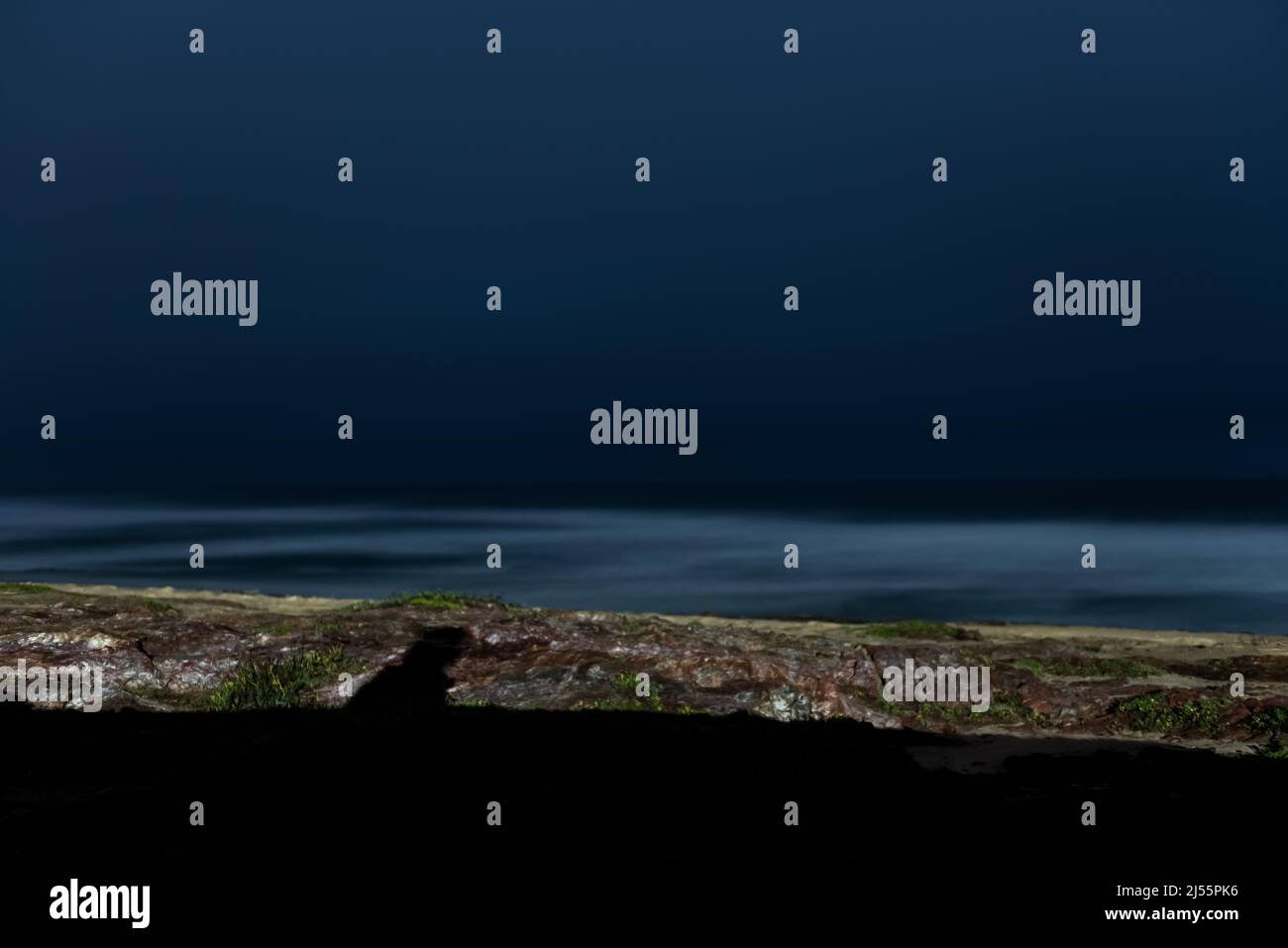 landscape of shadow cast on the beach with the silk effect sea Stock ...