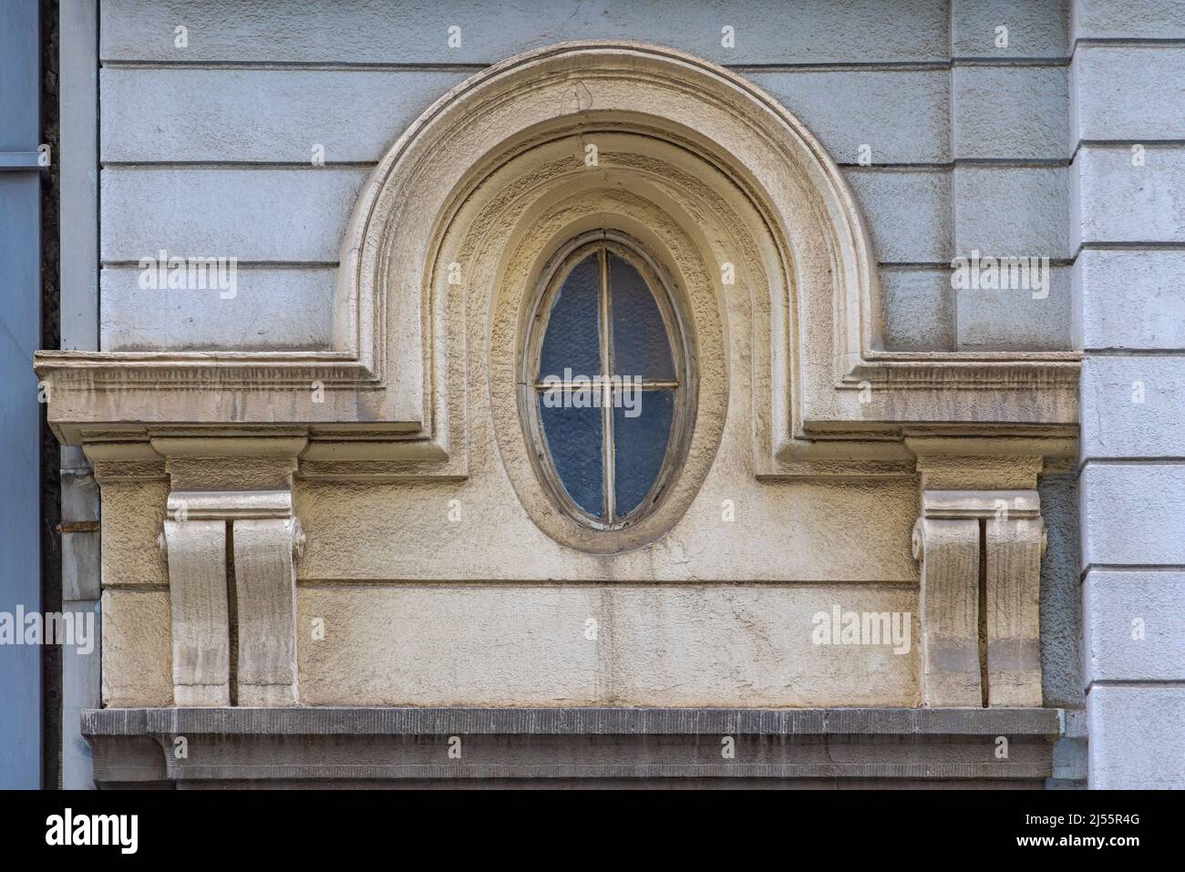 Vertical Oval Window With Cross Architectural Detail Stock Photo - Alamy