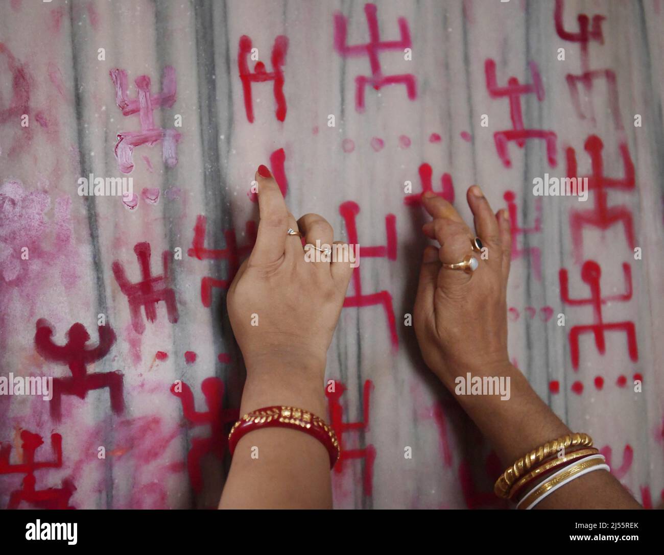 Female devotees share Sindur, red holy powder with each other at the ...