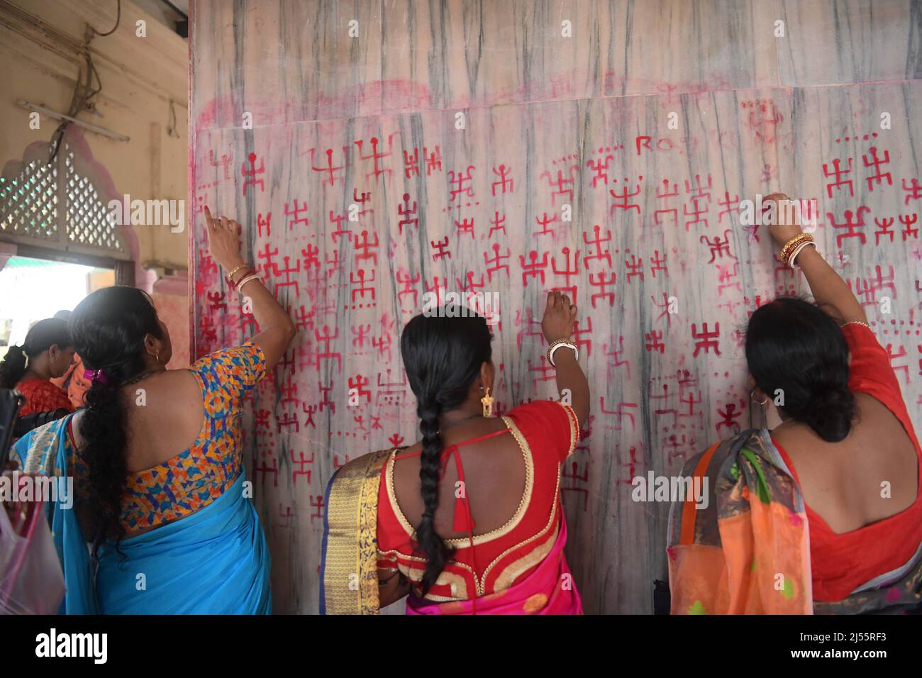Female devotees share Sindur, red holy powder with each other at the ...