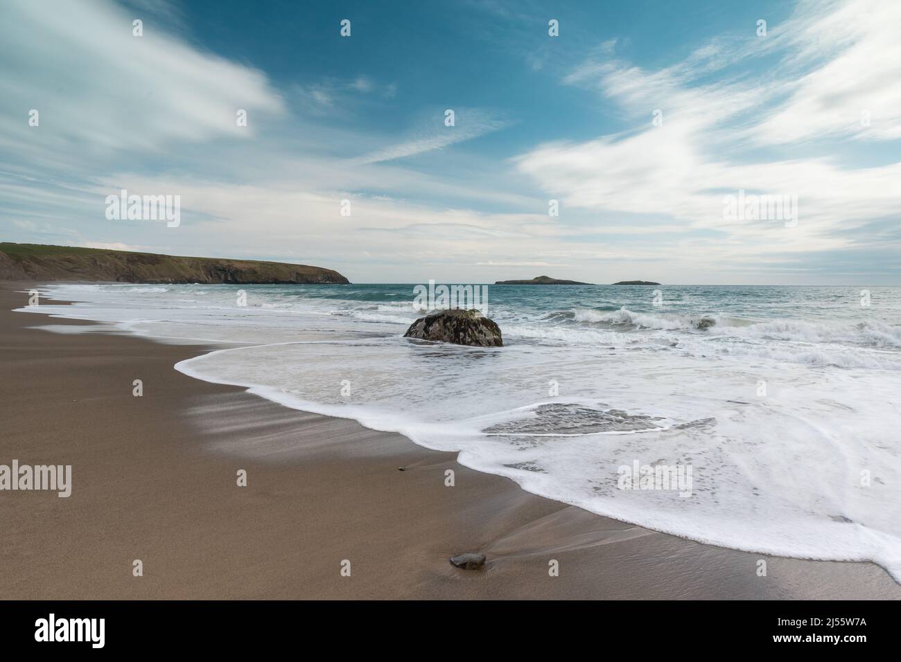 High tide at Aberdaron beach, with Ynys Gwylan-fawr and Ynys Gywlan ...