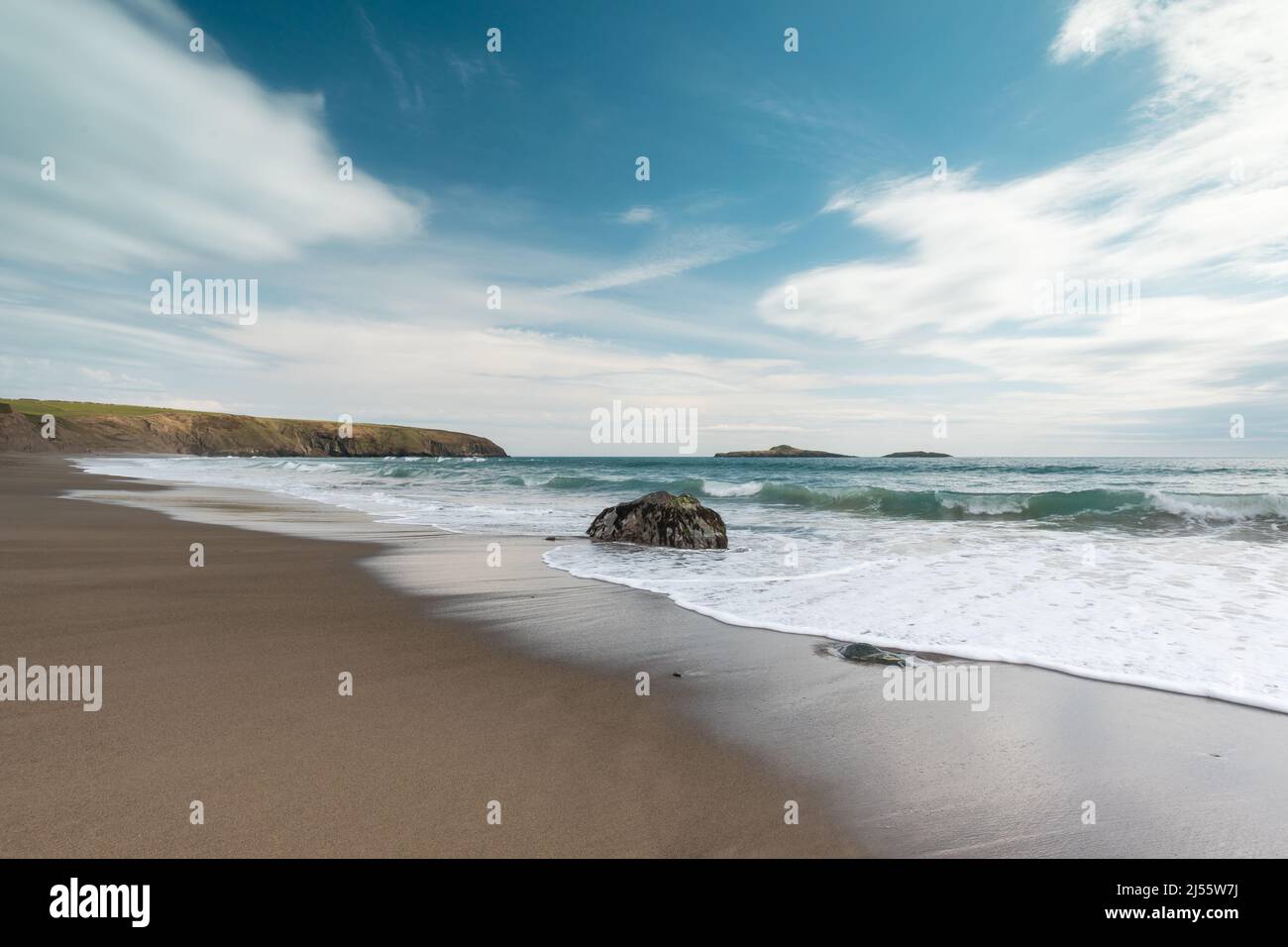 High tide at Aberdaron beach, with Ynys Gwylan-fawr and Ynys Gywlan ...