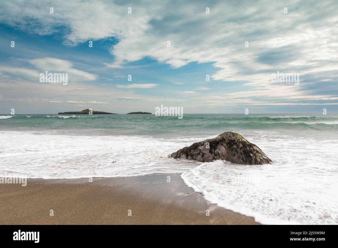 High tide at Aberdaron beach, with Ynys Gwylan-fawr and Ynys Gywlan ...